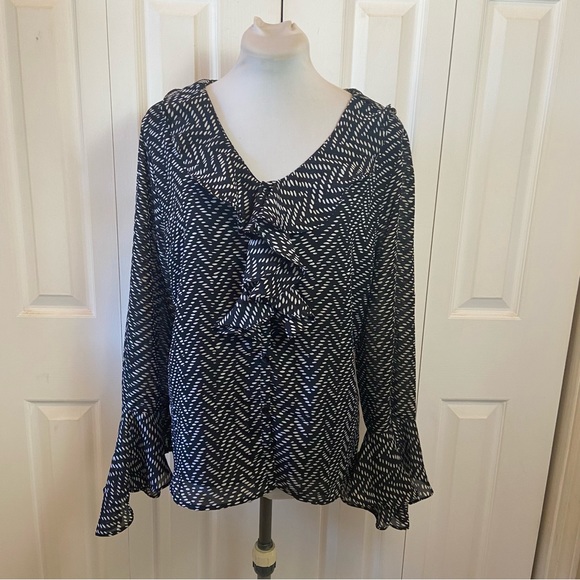 Milano | Tops | Milano Ruffle Front Herringbone Print Bell Sleeve ...